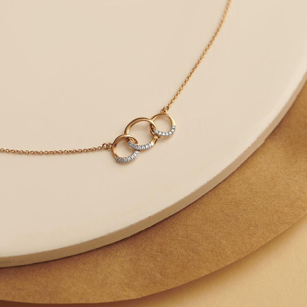 Tanishq infinity pendant price store