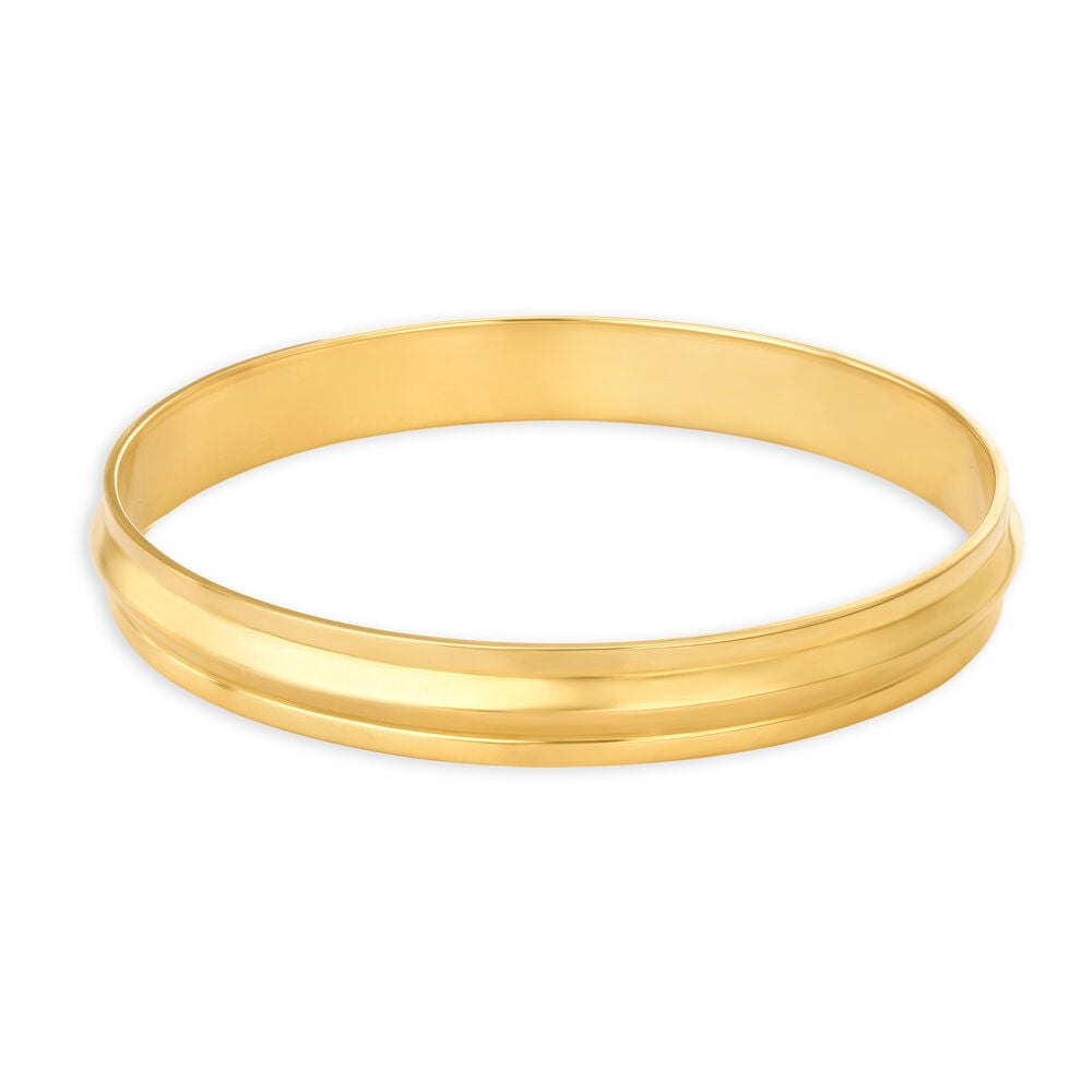 Buy Timeless Yellow Gold Ridged Bangle at Best Price | Tanishq UAE