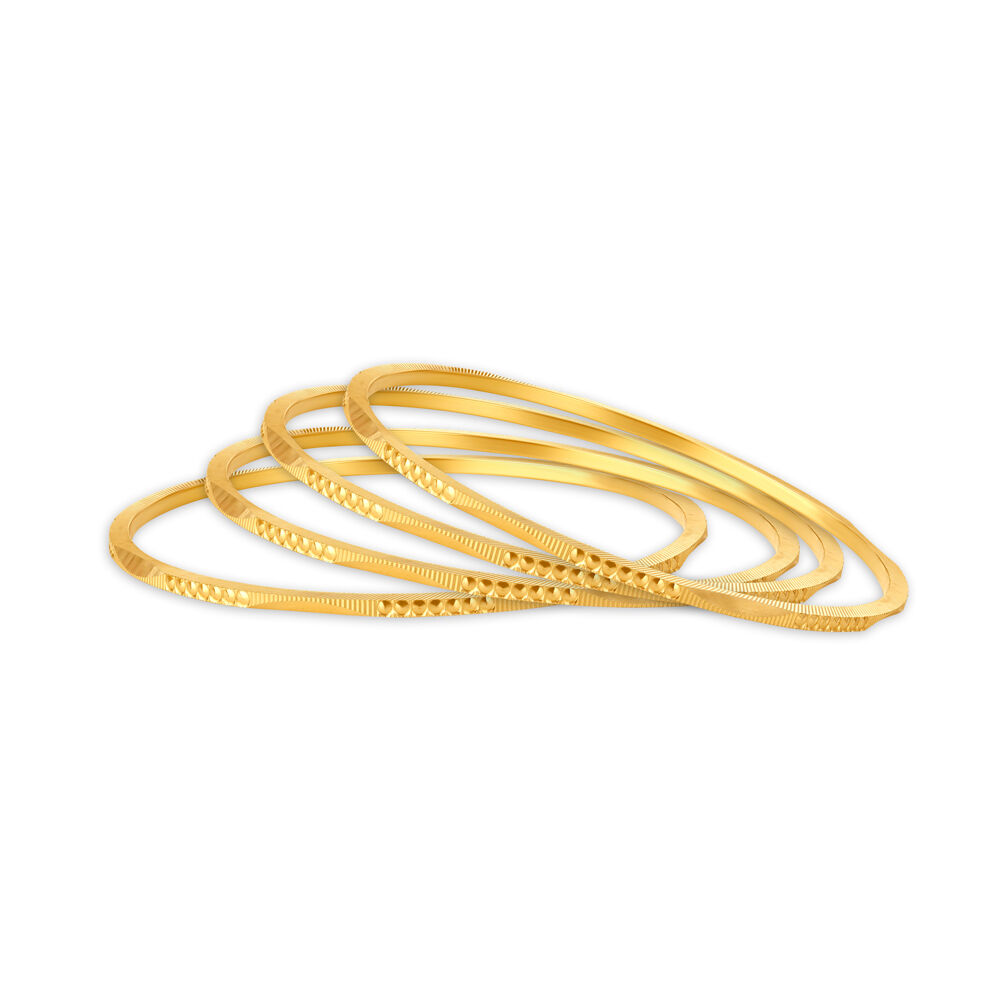 Buy Eclectic Yellow Gold Embossed Bangles at Best Price | Tanishq UAE