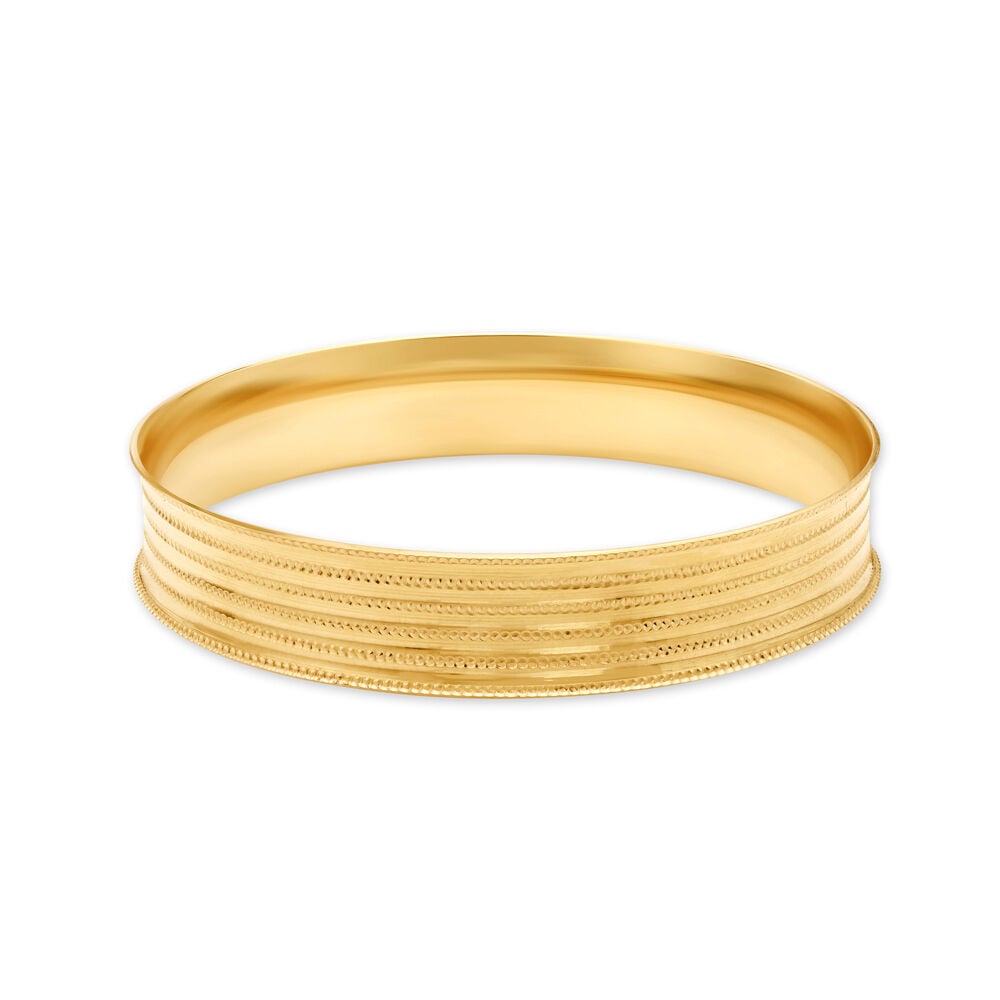 Buy Understated 22 Karat Yellow Gold Ridged Bangle at Best Price | Tanishq US