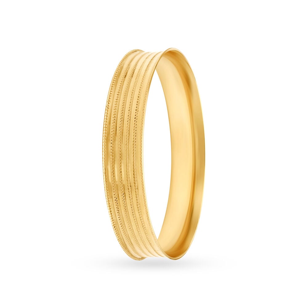 Buy Understated 22 Karat Yellow Gold Ridged Bangle at Best Price | Tanishq US