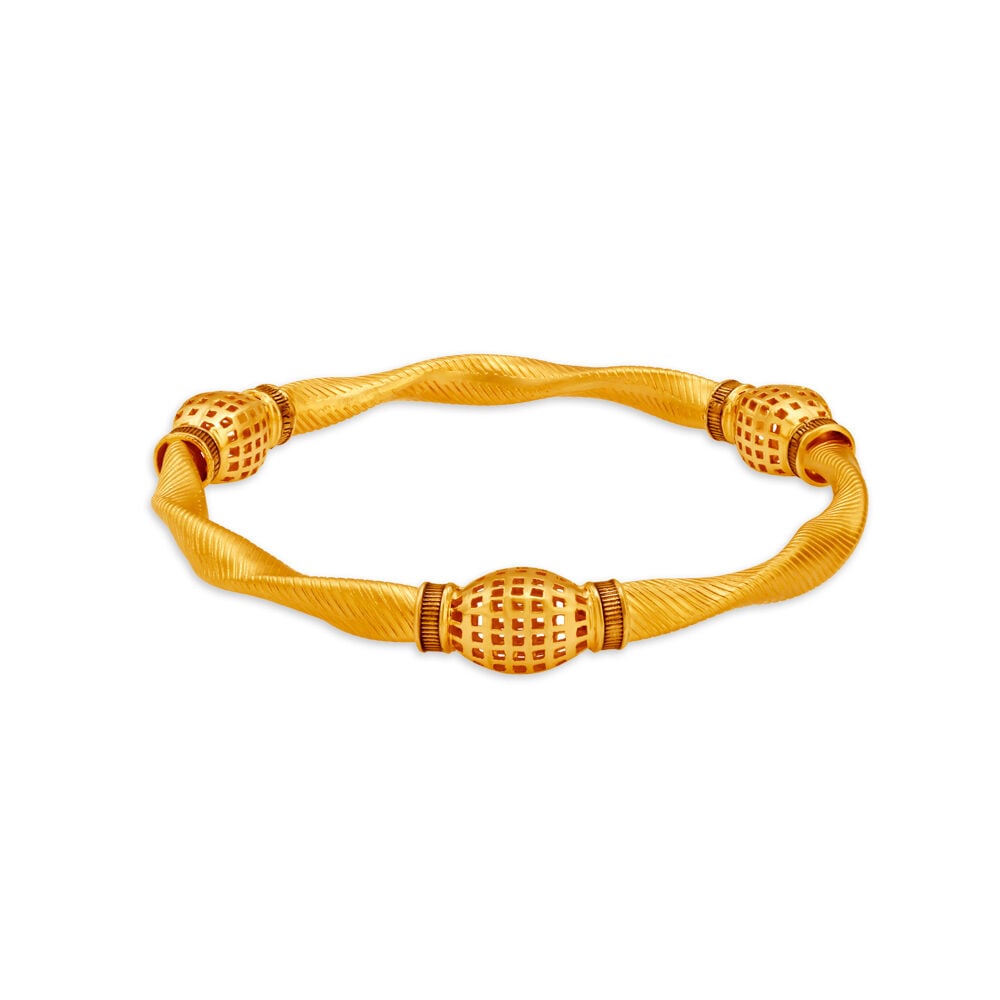 Buy Whimsical Twisted Gold Bangle at Best Price | Tanishq UAE