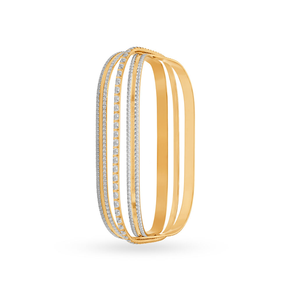 Buy Glimmering Yellow Gold Embossed Bangle at Best Price | Tanishq US