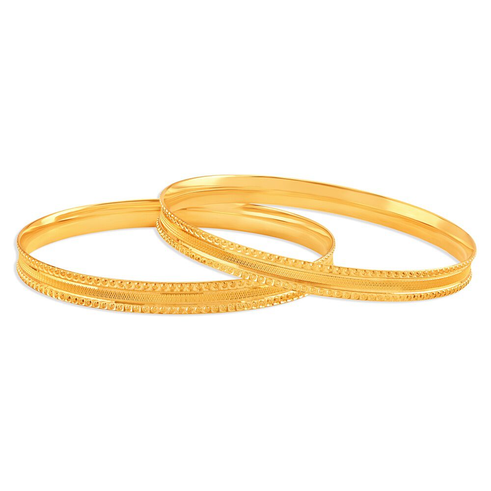 Buy Carved Gold Bangle at Best Price | Tanishq UAE