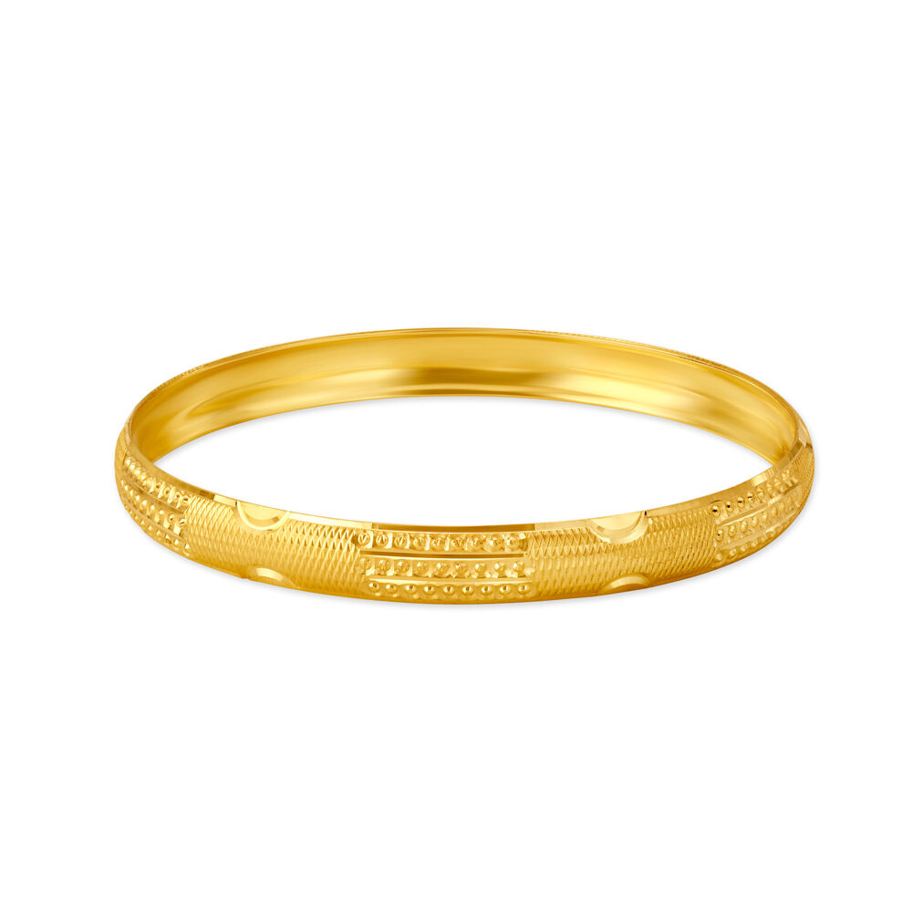 Buy Richly Carved Gold Bangle at Best Price | Tanishq UAE