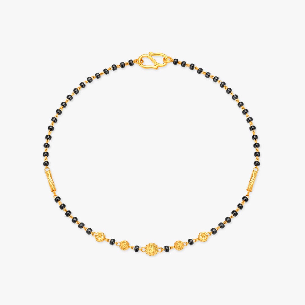 Buy Stylish Black and Carved Gold Bead Bracelet at Best Price | Tanishq US