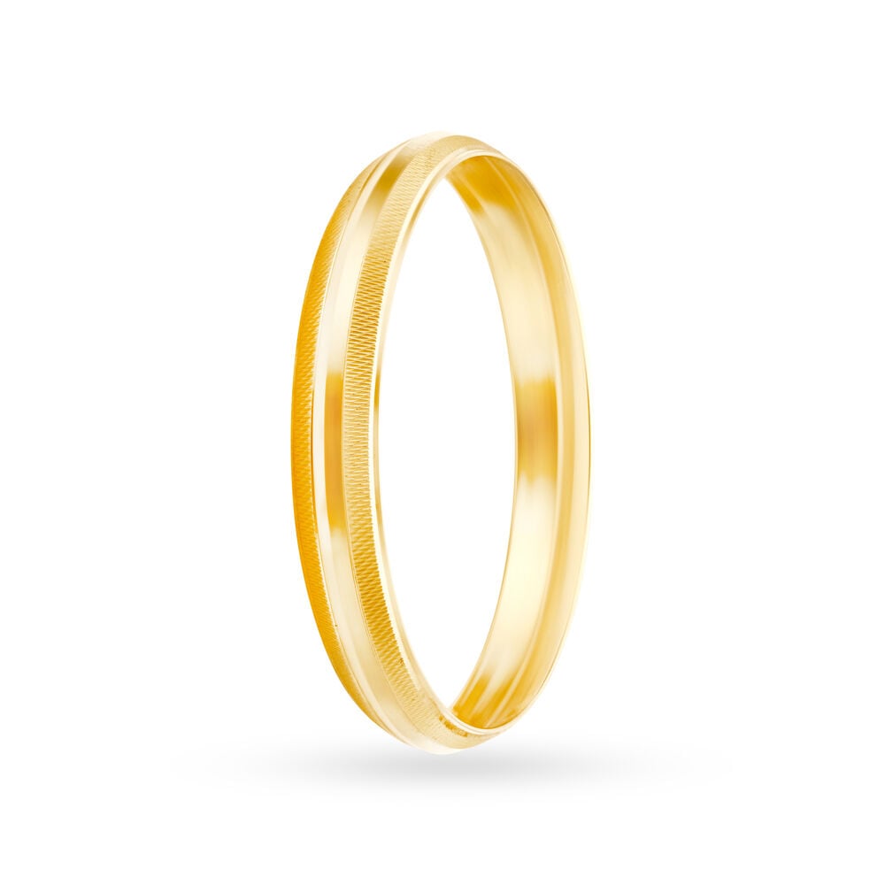 Buy Marvelous Yellow Gold Ridged Bangle at Best Price | Tanishq US