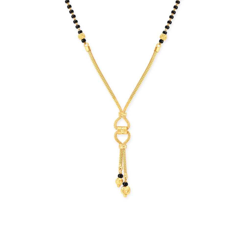 Gold mangalsutra designs with price in tanishq store