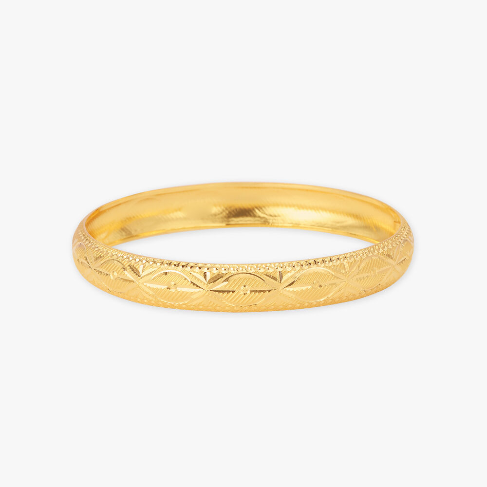 Buy Heritage Gold Engraved Bangle at Best Price | Tanishq US