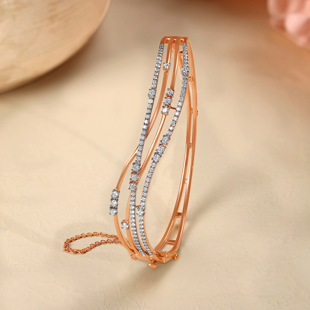 Modern Oval Diamond Bangle in Rose Gold