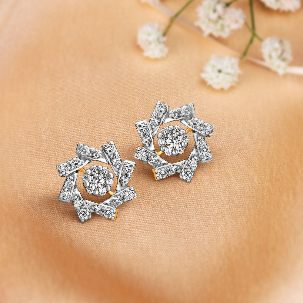 Radiant 18 Karat Yellow Gold And Diamond Floral Studs